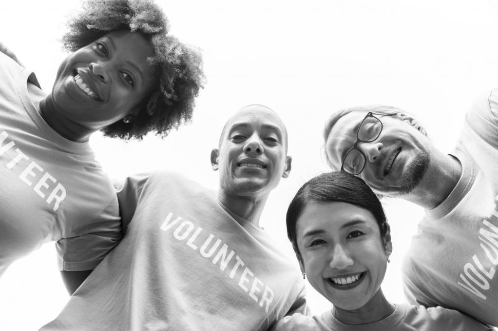 Free Stock Photo of Low angle view looking up at a volunteers huddle in ...
