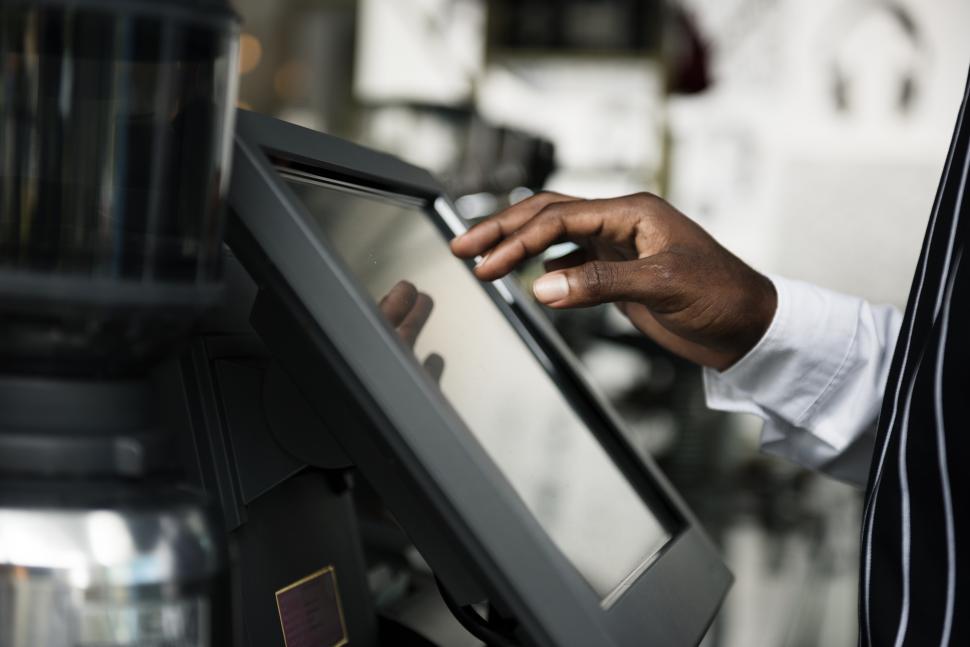 Free Stock Photo of A cafe waiter s hand taking order on the kiosk ...