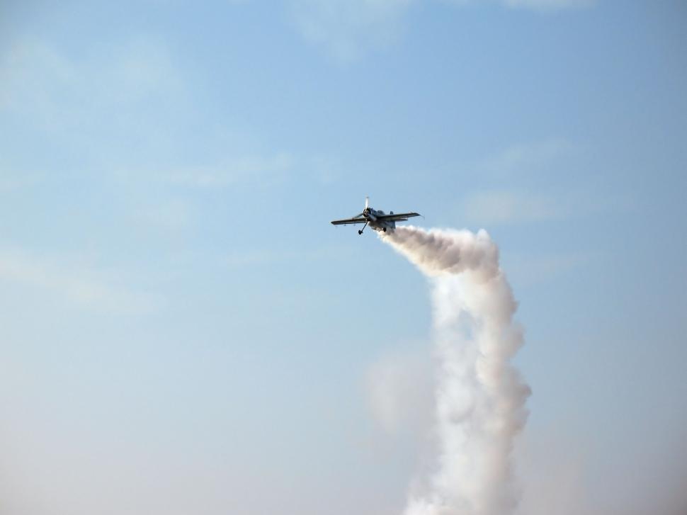 Free Stock Photo of Aerobatic plane making loopings in the air ...