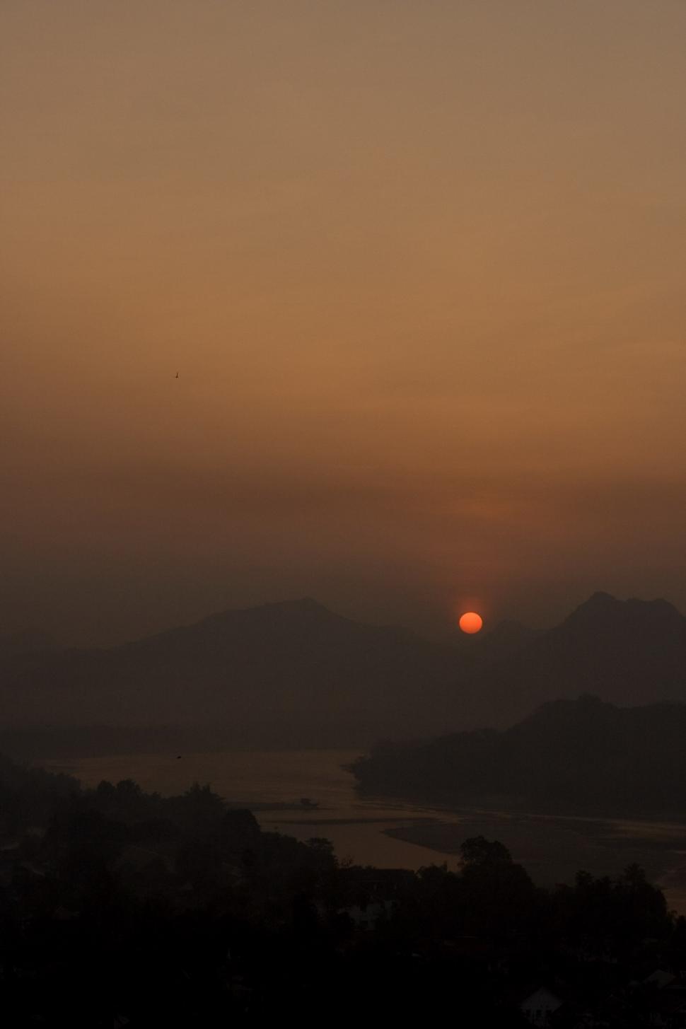 Free Stock Photo of Sun Setting Over Mountain Range | Download Free ...