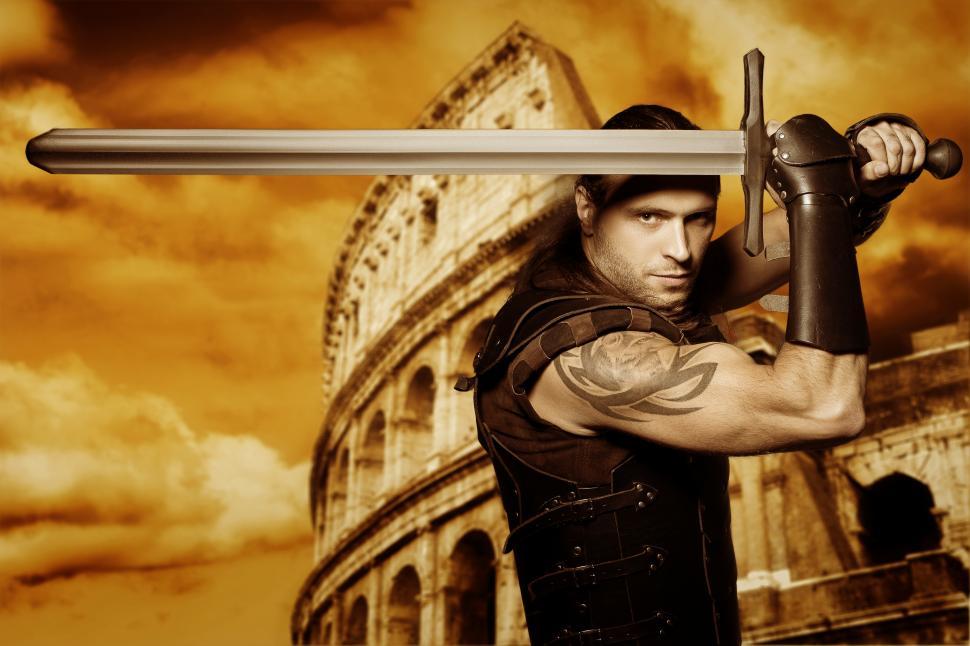Free Stock Photo of Lone gladiator with a longsword stands in front of ...