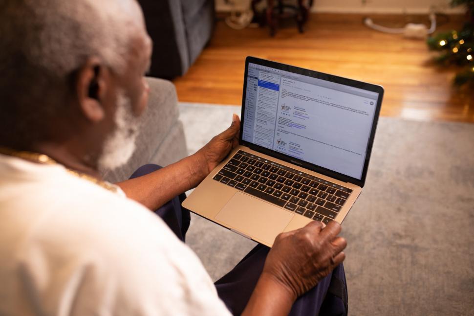 Free Stock Photo of Man working on laptop at home in living room ...
