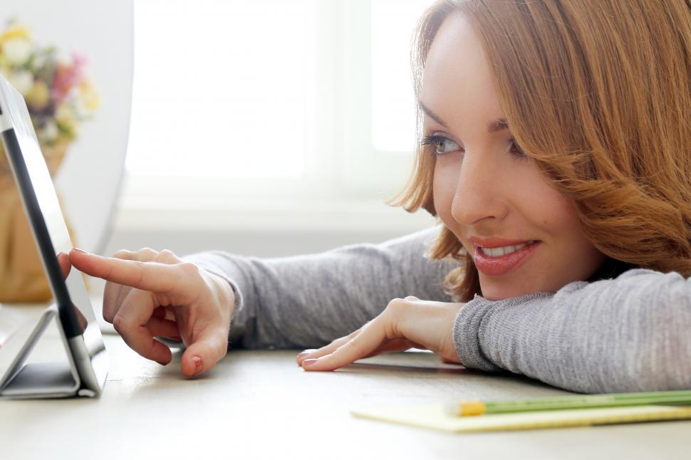 Free Stock Photo of Lifestyle. Woman in the office using tablet device ...