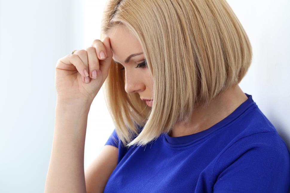 Free Stock Photo of Attractive woman with hand on forehead, thinking ...