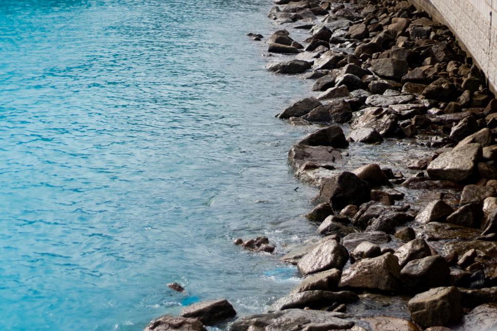 Free Stock Photo of Small waves hitting shallow rocks on the beach ...
