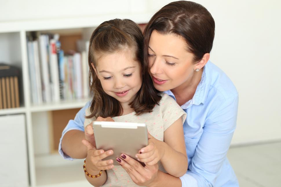Free Stock Photo of Mother helping daughter with tablet computer ...