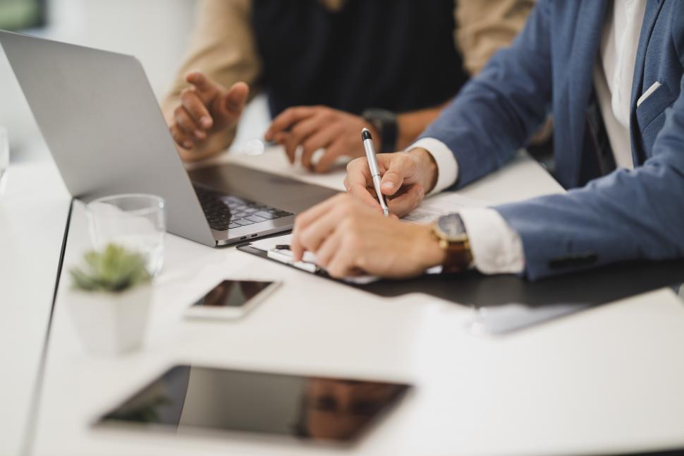 Free Stock Photo of Office workers checking papers with pen in office ...
