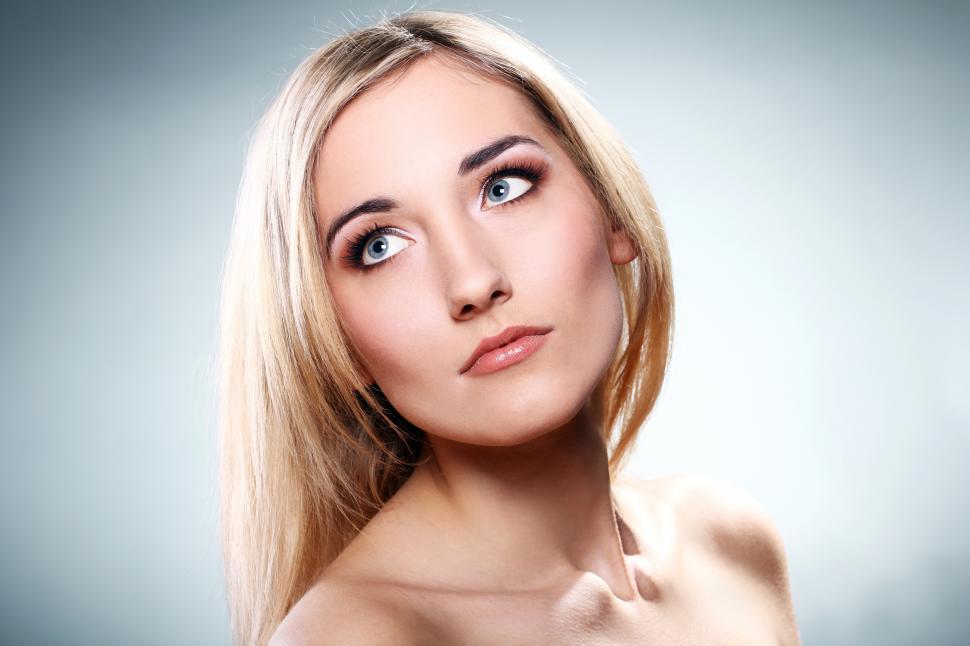 Free Stock Photo of Young woman looking off camera, head tilted ...