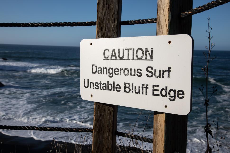 Free Stock Photo of Sign warns of Dangerous Surf and Unstable Bluff ...