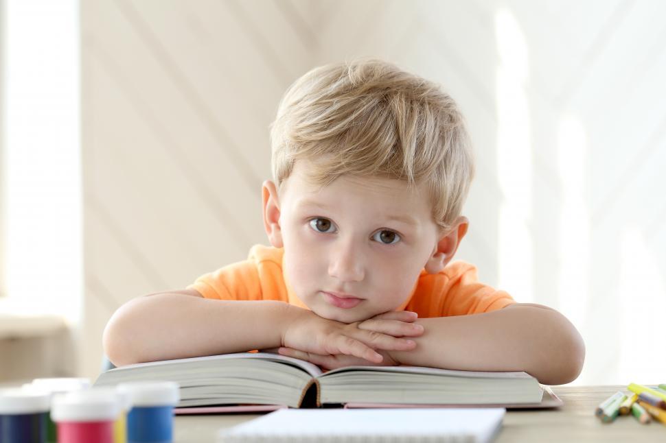 Free Stock Photo of Little bot looking dejected over an open book ...