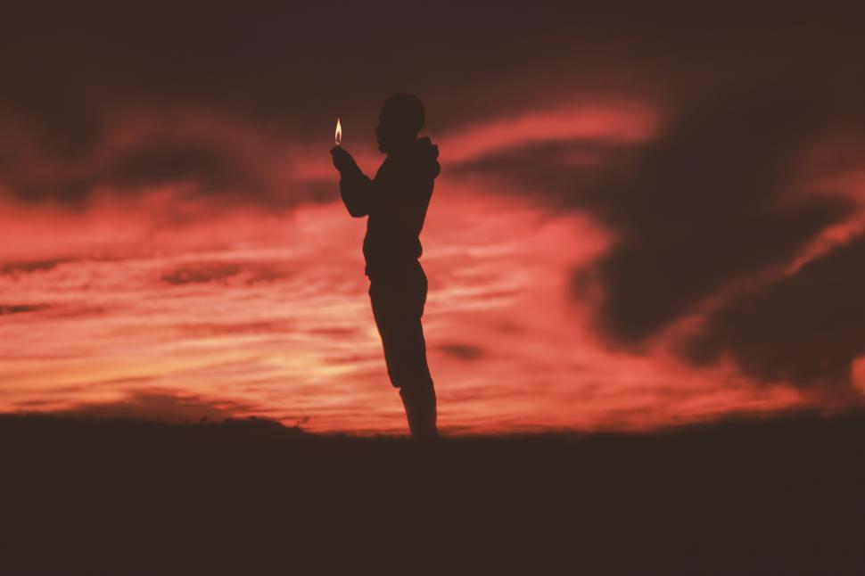 Free Stock Photo of Man with burning fire lamp and sunset | Download ...