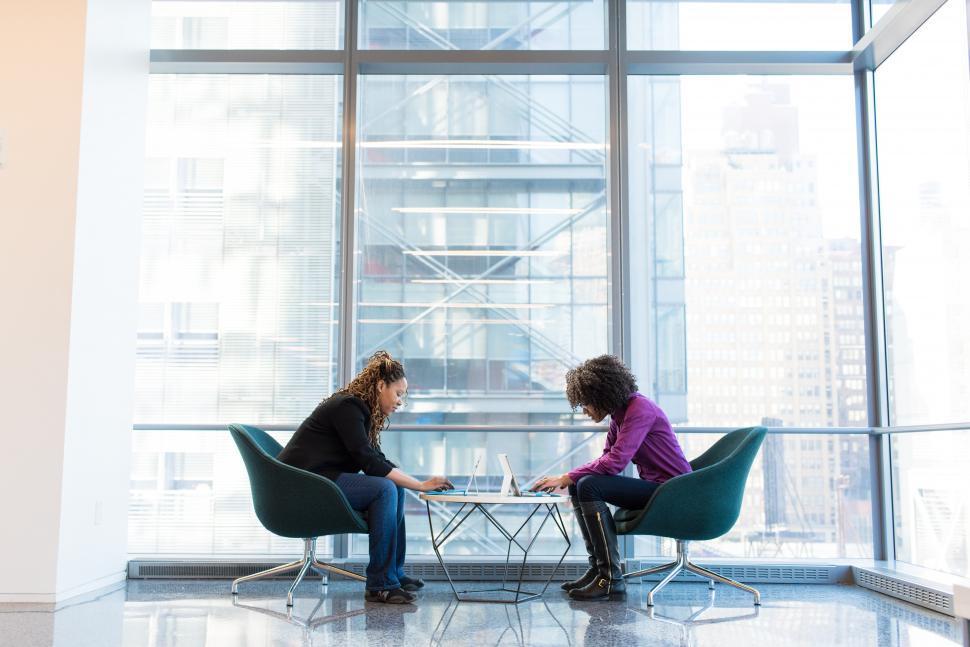 Free Stock Photo of Female co-workers using tablet device | Download ...