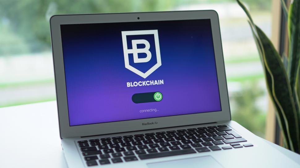 Free Stock Photo of Laptop Displaying Blockchain Logo | Download Free ...