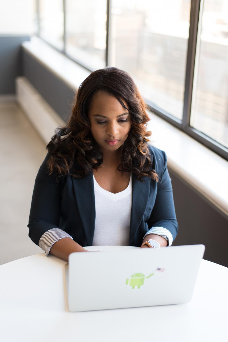 Free Stock Photo of Businesswoman using laptop in office | Download ...