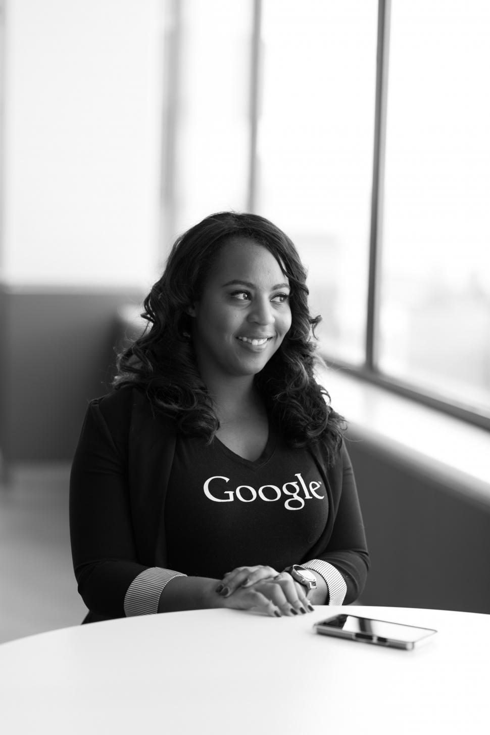 Free Stock Photo of Female executive with smartphone on table - looking ...