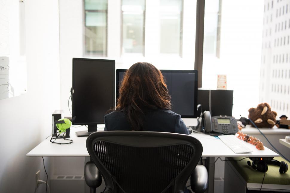 Free Stock Photo of Female executive with computer at the desk ...