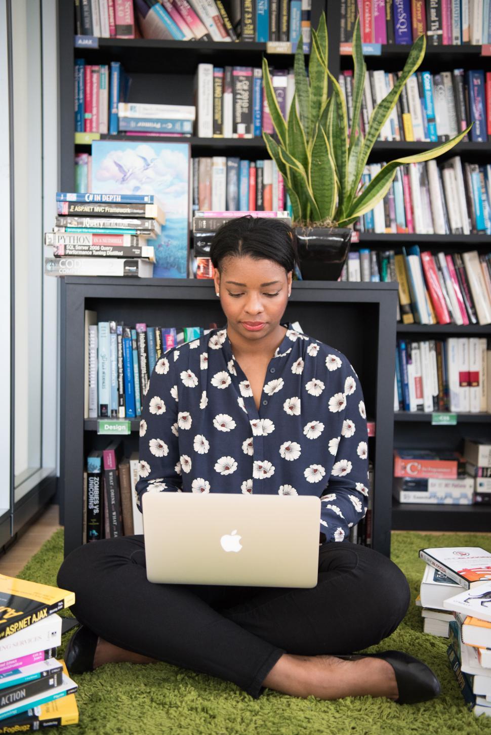 Free Stock Photo of Female developer with laptop in library | Download ...