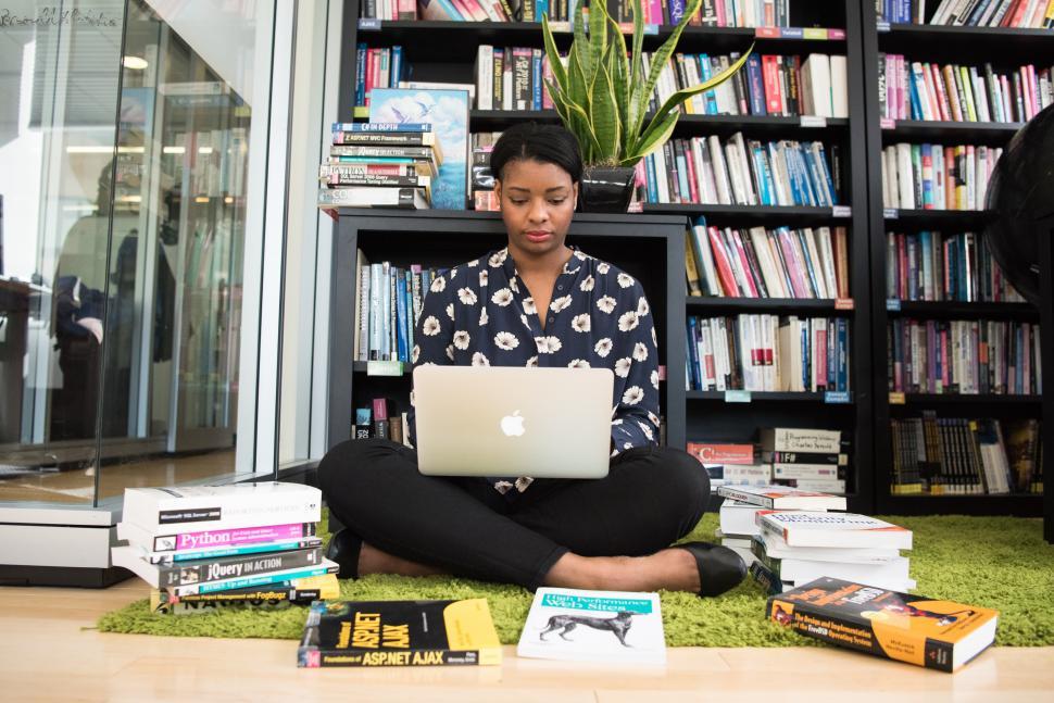 Free Stock Photo of Female developer with laptop in library | Download ...