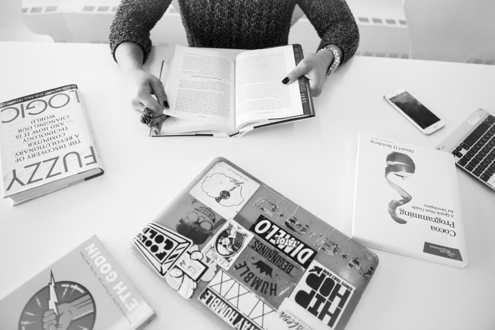 Free Stock Photo of Female developer with books and laptop -b&w ...