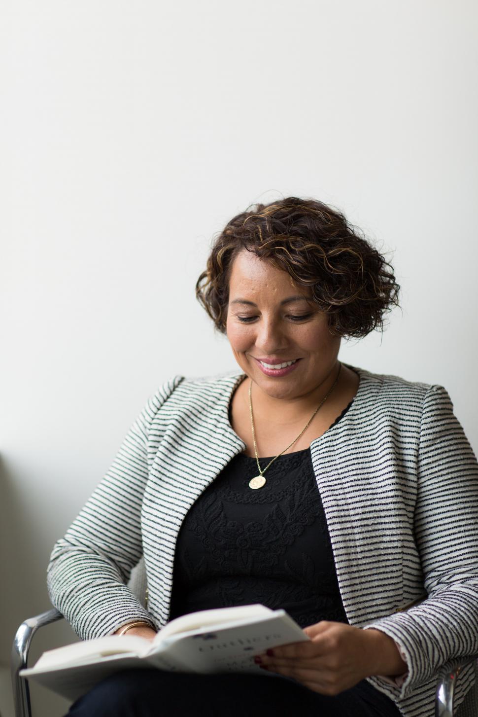 Free Stock Photo of Happy Businesswoman with book | Download Free ...