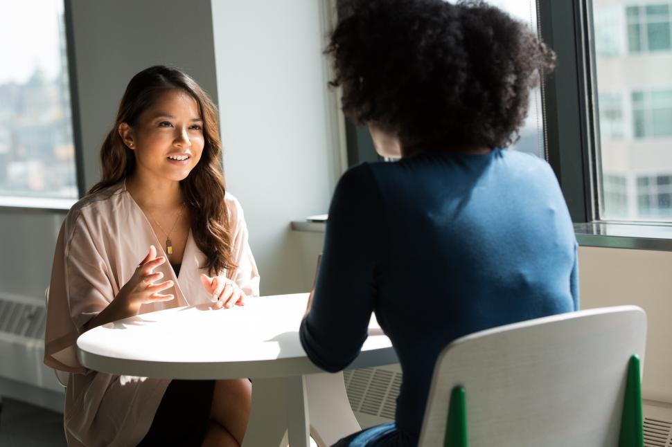 Free Stock Photo of Two business women having a conversation | Download ...
