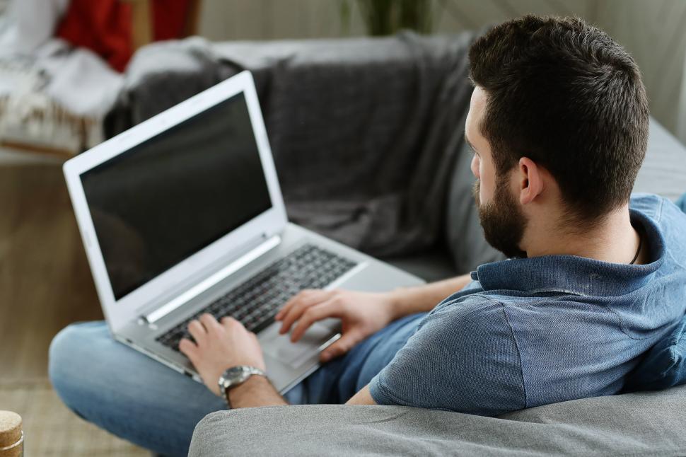Free Stock Photo of Seated man using laptop | Download Free Images and ...
