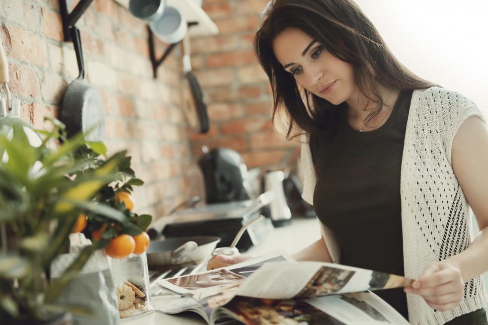 Free Stock Photo of Woman flipping through magazine | Download Free ...