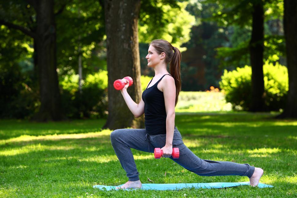 Free Stock Photo of Young woman doing lunges with dumbbells | Download ...