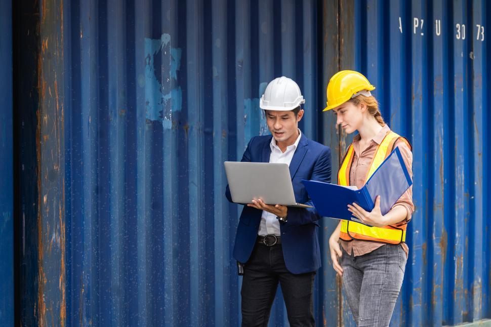 Free Stock Photo of Two engineers looking at specifications | Download ...
