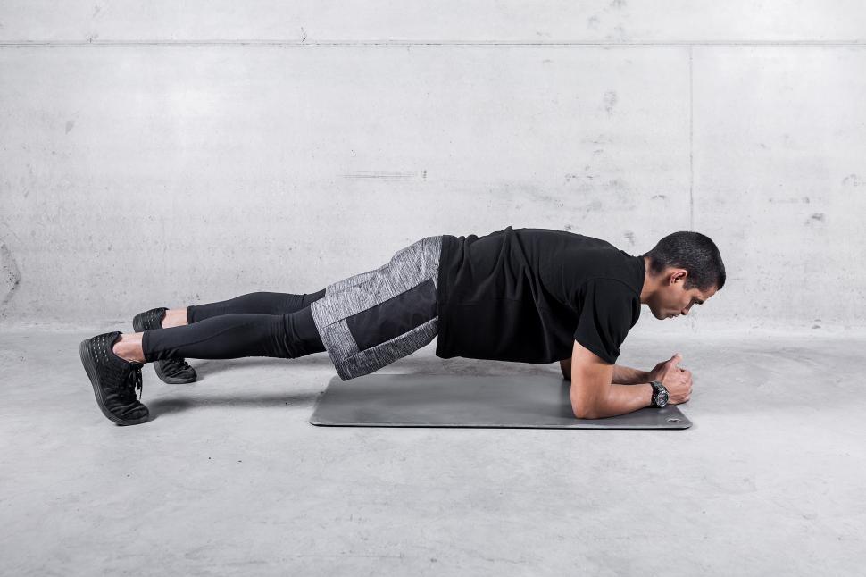 Free Stock Photo of Sportsman in plank posture training abdomen ...