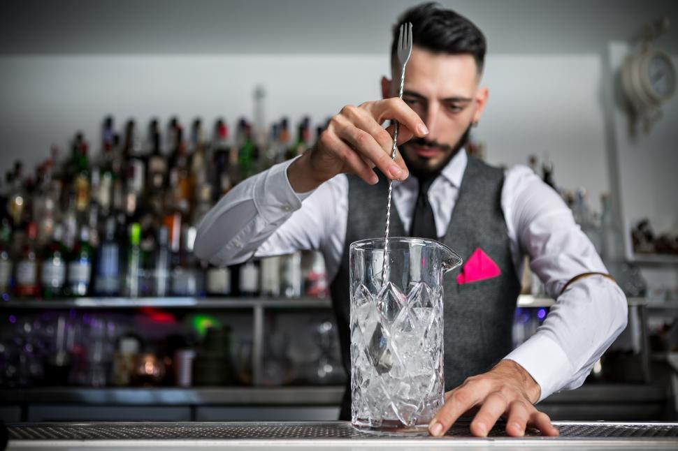 Free Stock Photo of Bartender mixing cocktail in glass | Download Free ...