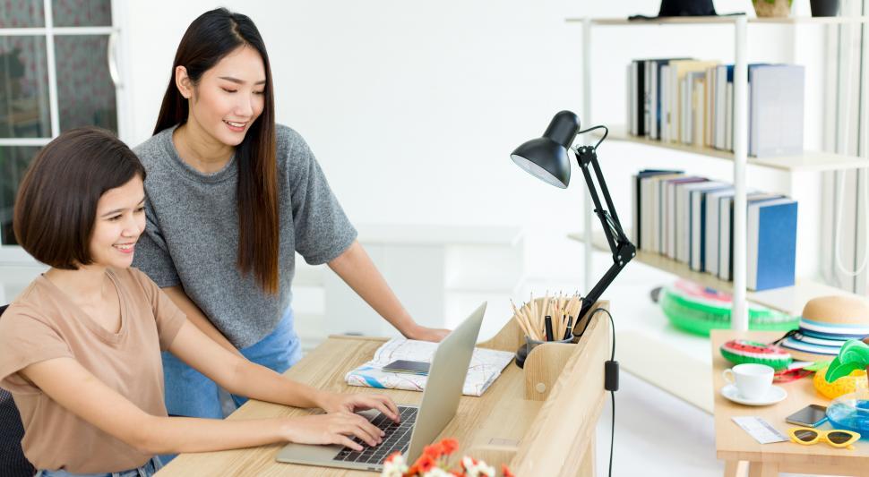 Free Stock Photo of Women are booking hotels online on the laptop ...