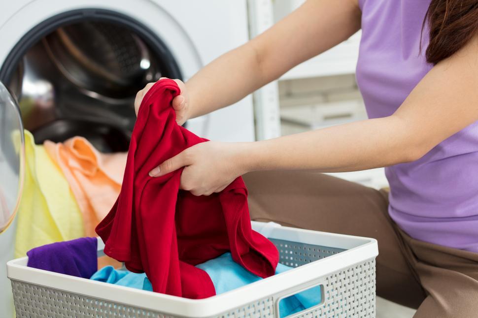 Free Stock Photo of Woman s hand is rubbing the cloth to remove the ...