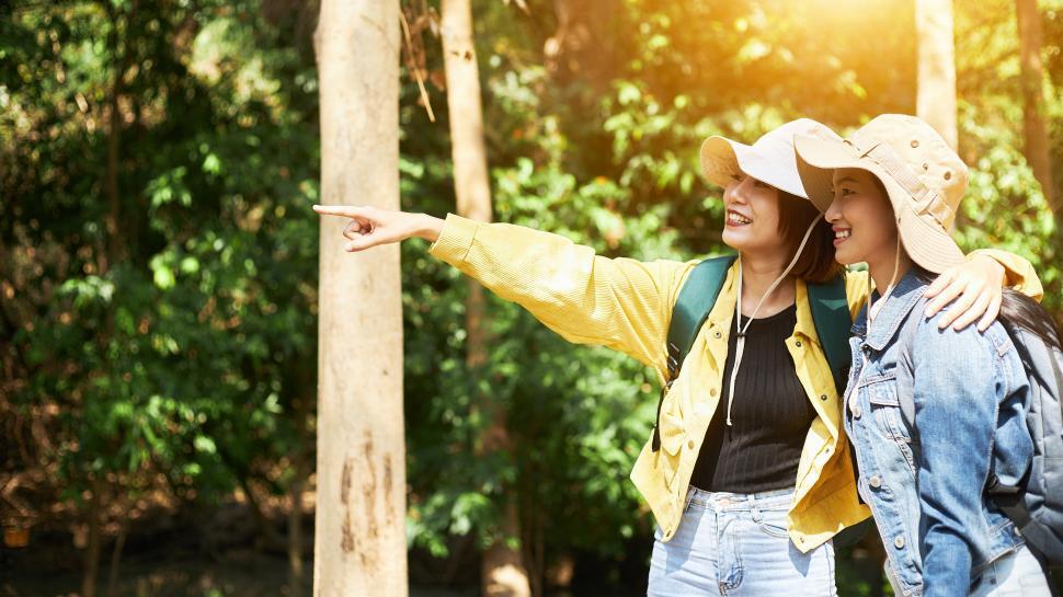Free Stock Photo of Two female travelers enjoy touring in the wild ...