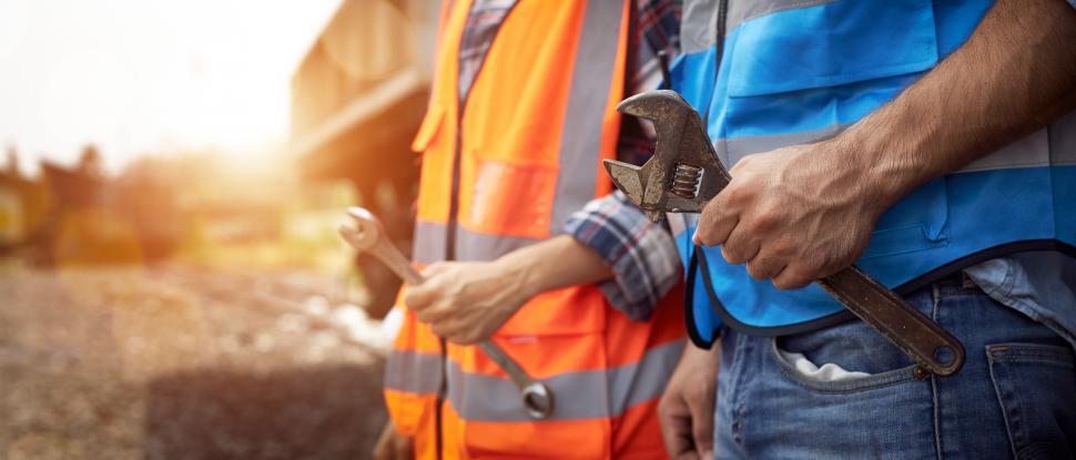 Free Stock Photo of Hands of maintenance worker holding a wrench ...