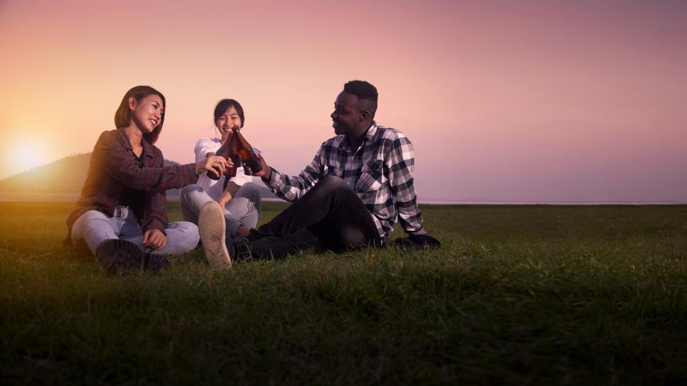 Free Stock Photo of A group of friends enjoye a sunset party with ...