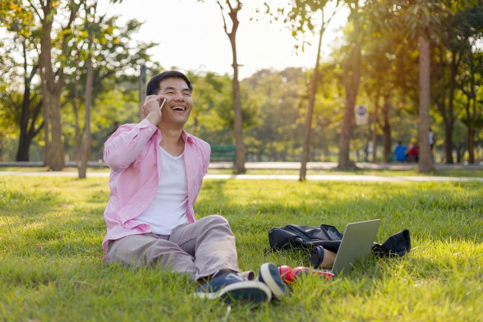 Free Stock Photo of Happy Asian man talking on the phone | Download ...