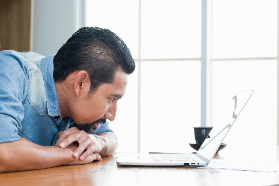 Free Stock Photo of Business Owner staring at the laptop screen ...