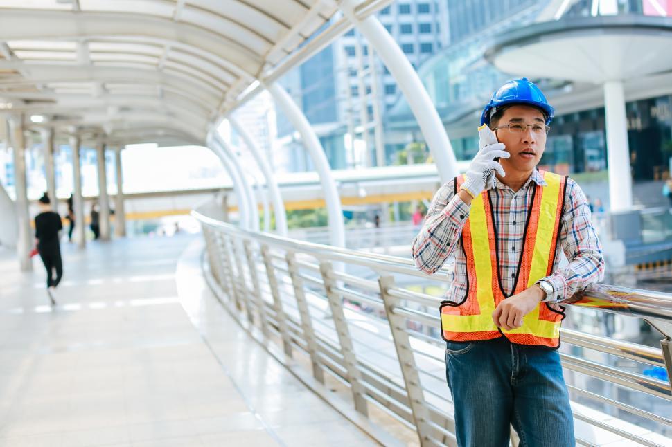 Free Stock Photo of Male engineers are talking on the phone | Download ...