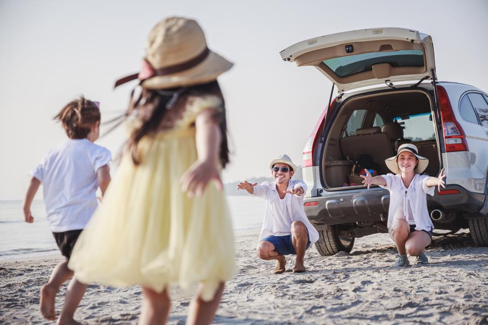 Free Stock Photo of Happy family with children playing at the beach ...