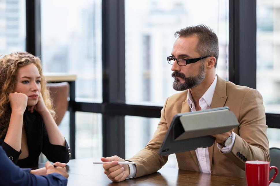 Free Stock Photo of Businessman presenting on digital tablet | Download ...