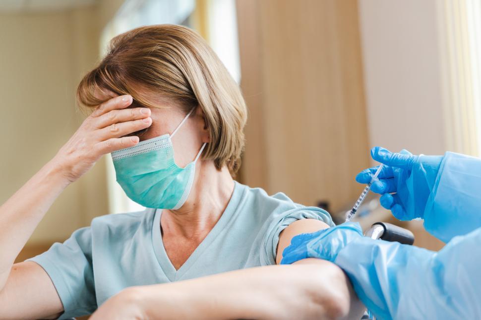 Free Stock Photo of Woman receiving vaccination - needle anxiety ...