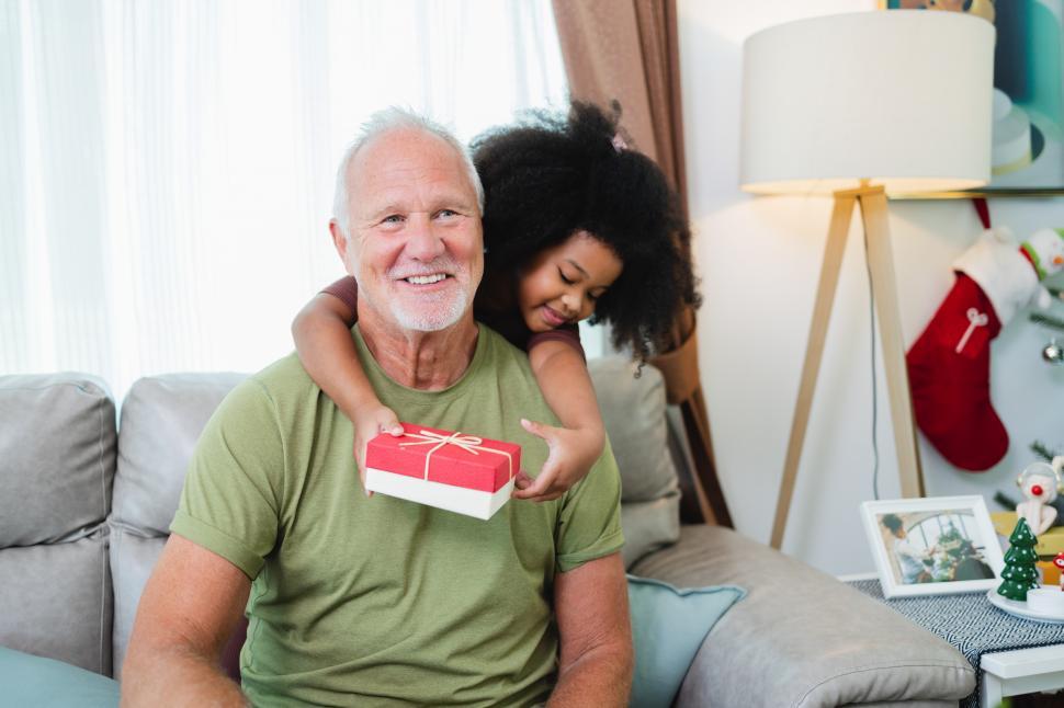 Free Stock Photo of Young girl is excited to share gift with family ...