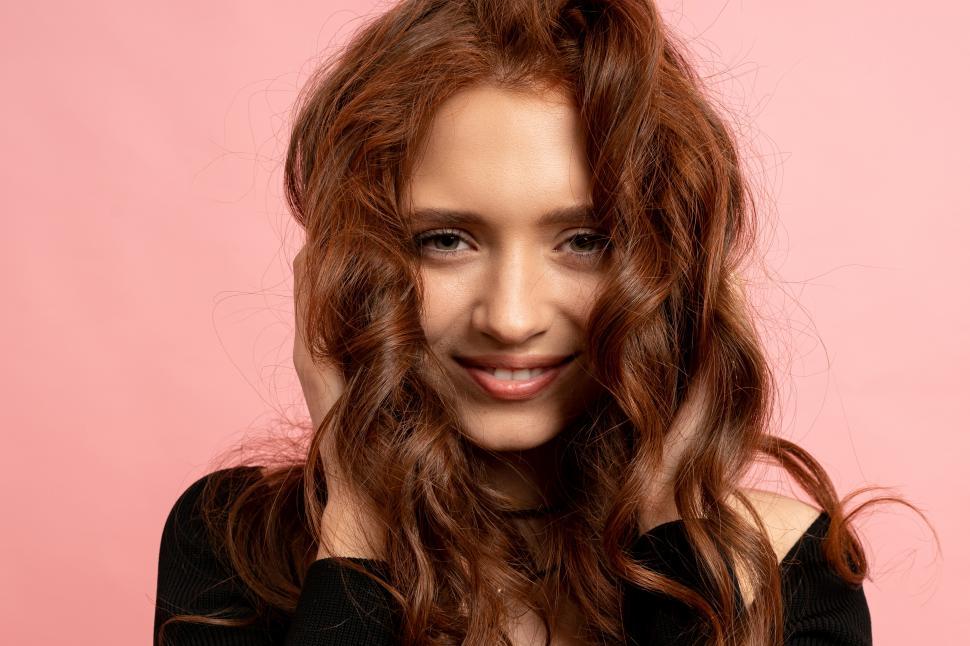 Free Stock Photo of Red headed woman posing over pink background ...