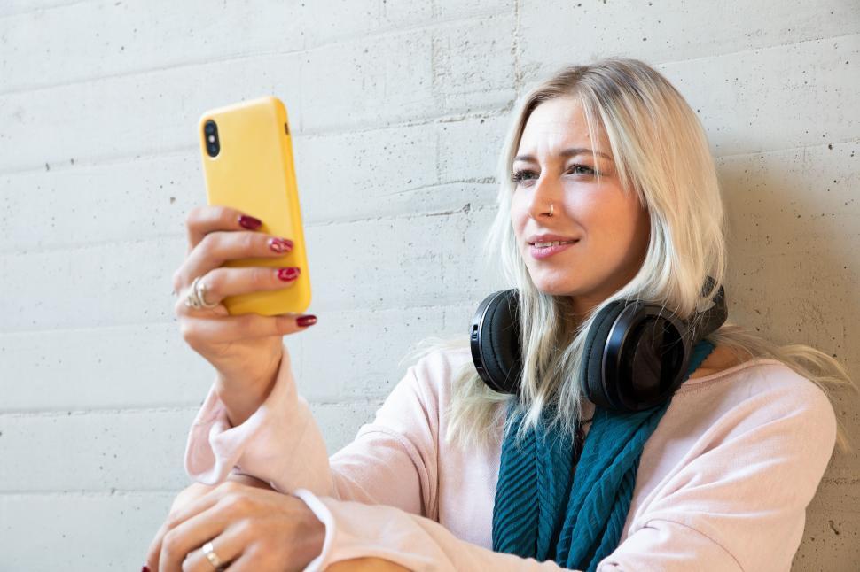 Free Stock Photo of Young woman having a rest and checking her ...