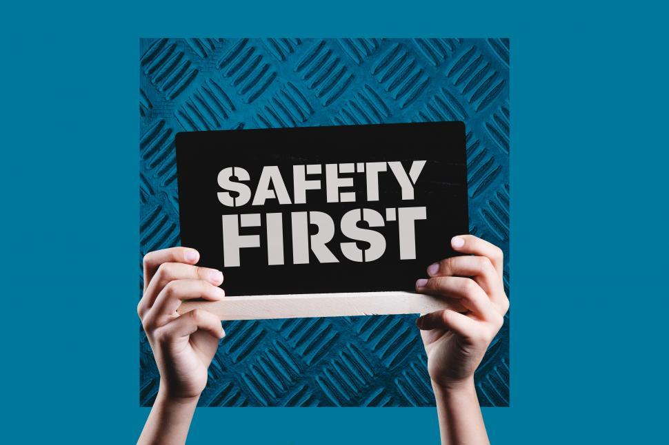 Free Stock Photo of hands holding placard with the message SAFETY FIRST ...