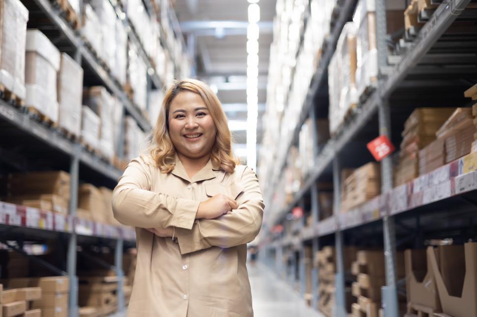 Free Stock Photo of Portrait of female worker looking at camera while ...