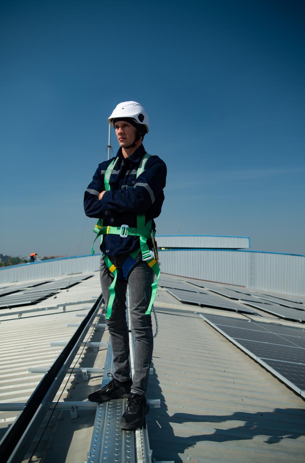 Free Stock Photo of Engineer in charge of solar panel installation ...