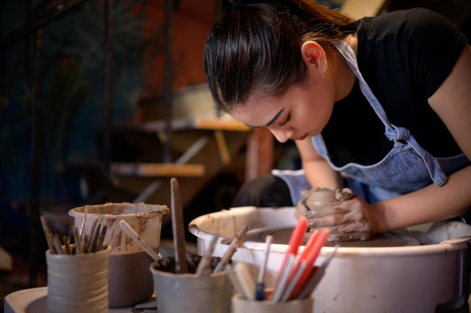 Free Stock Photo of Potter centering clay on pottery wheel, preparing ...
