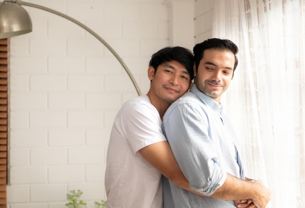 Free Stock Photo of Happy young couple - man embraces his boyfriend or ...
